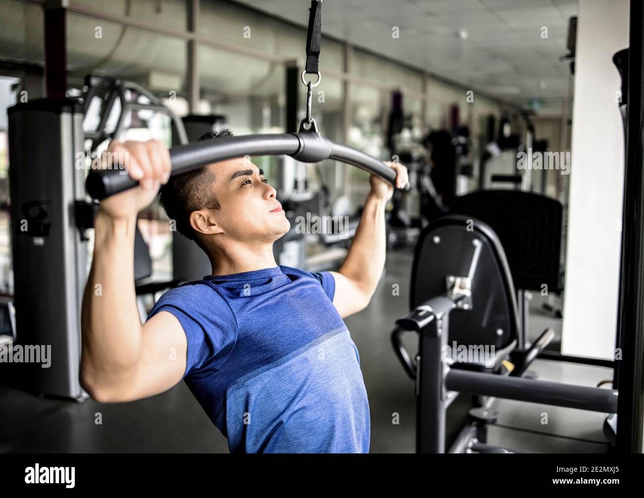 Young chinese man exercising gym hi-res stock photography and images ...