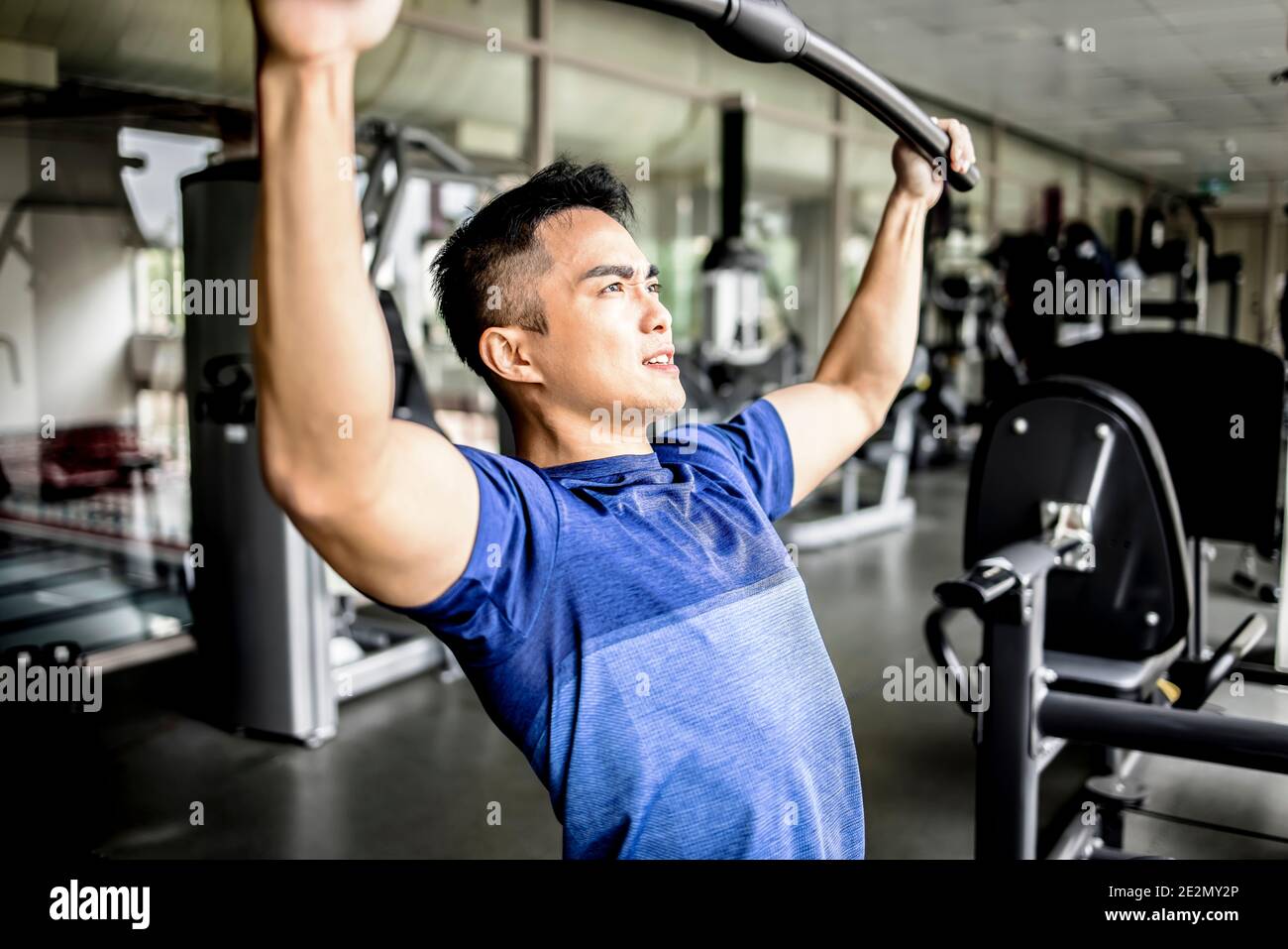 Young chinese man exercising gym hi-res stock photography and images ...