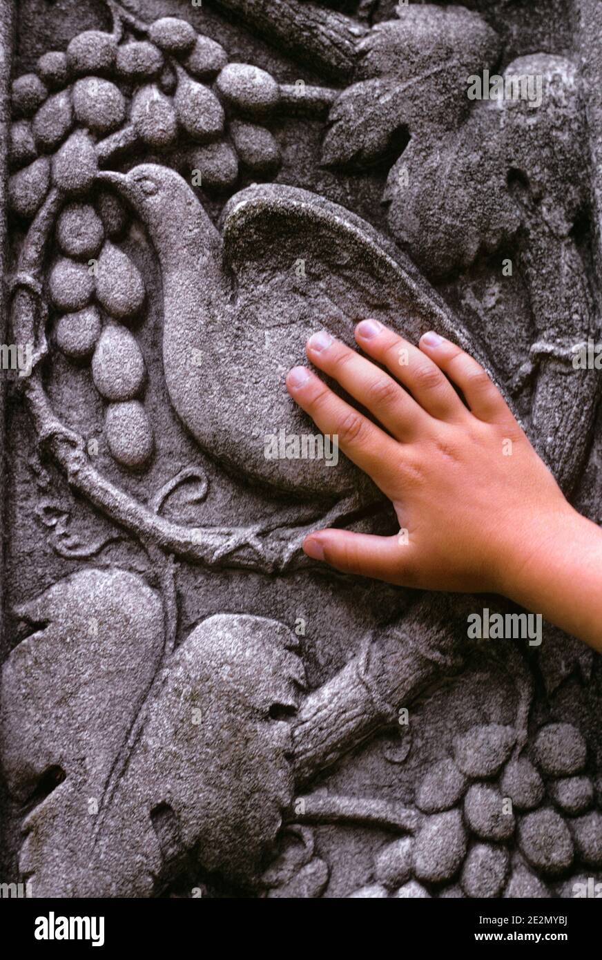 1970s HAND OF CHILD TOUCHING DOVE OF PEACE CARVED ON MEMORIAL TOMBSTONE ...