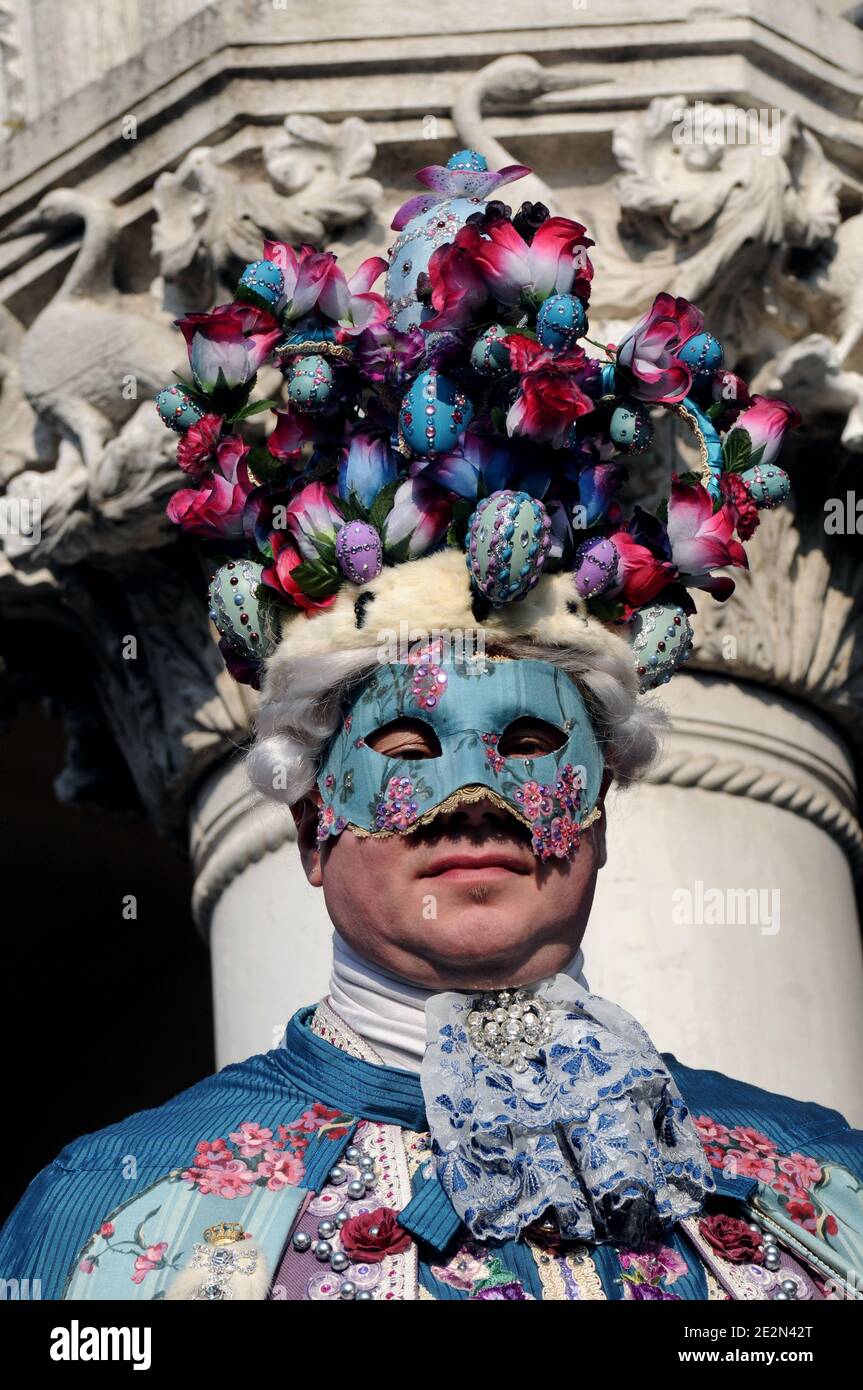 A masked reveller poses during the Carnival of Venice, Italy on ...