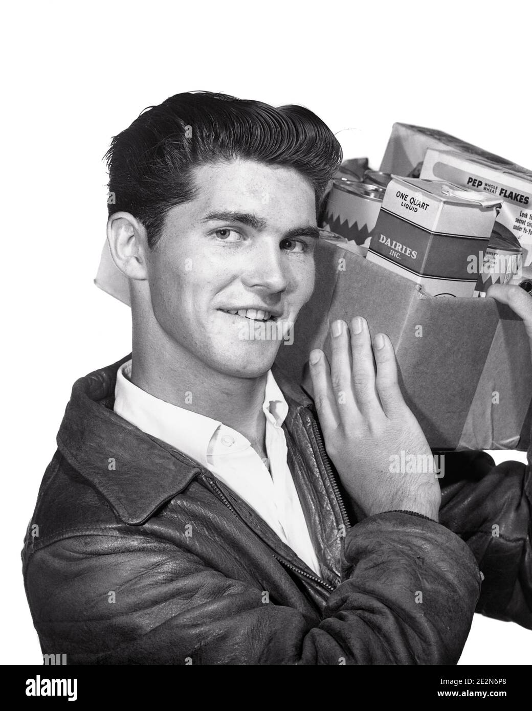 Carrying groceries teenager hi-res stock photography and images - Alamy