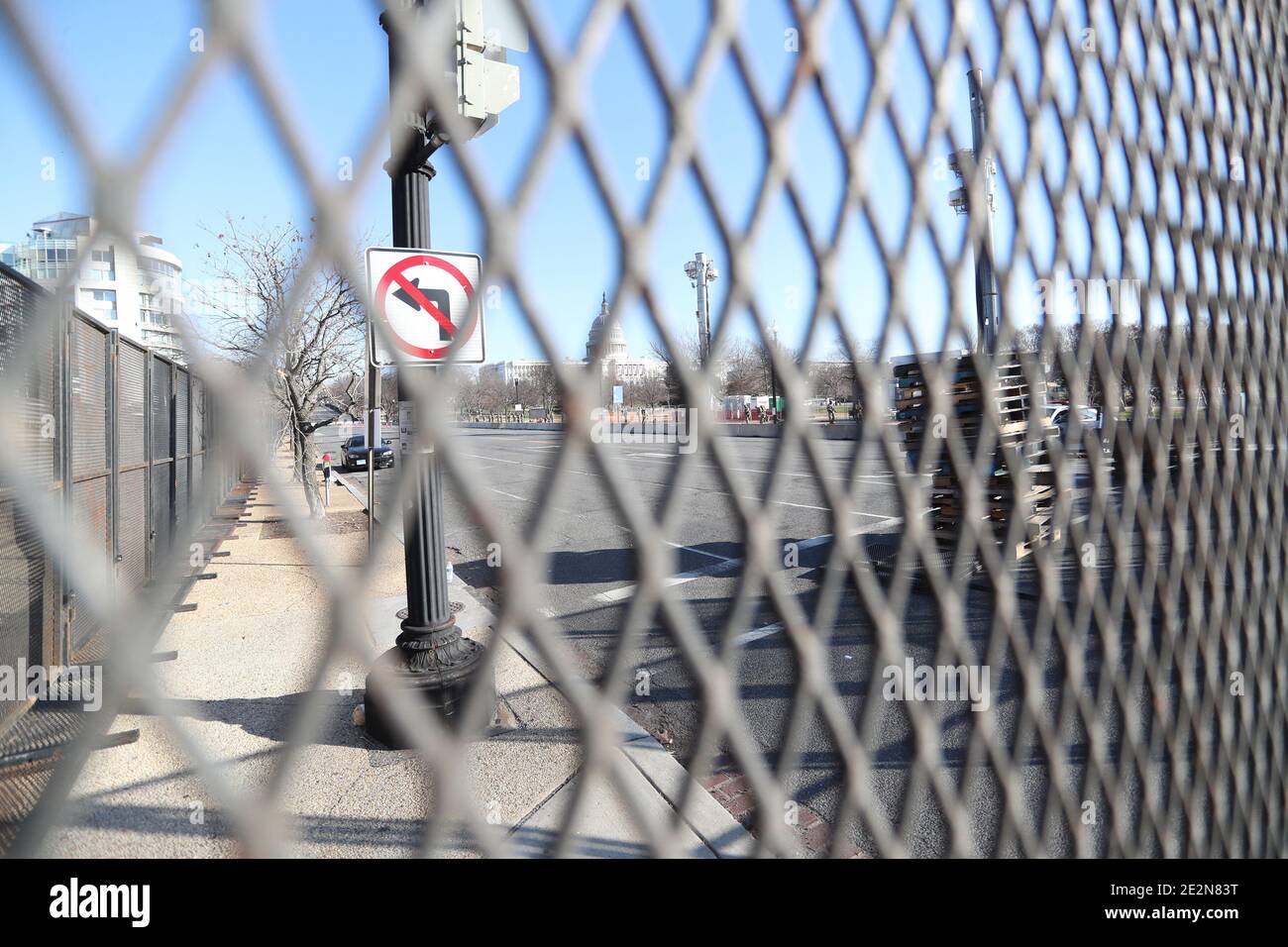 Washington, DC, USA. 14th Jan, 2021. A view through temporary fencing ...