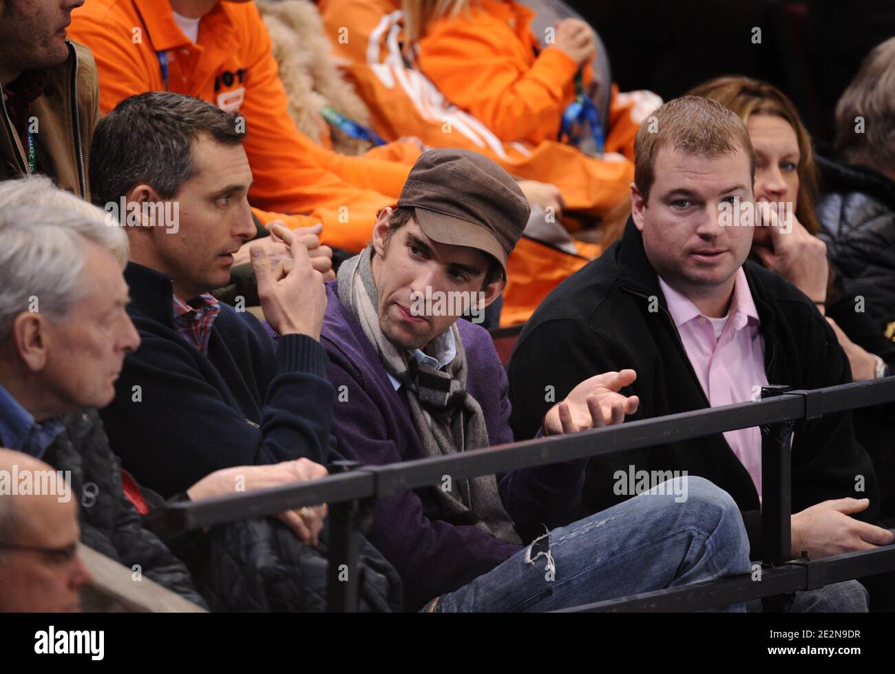 Olympic swimmer champion Michael Phelps watching with friends the short ...
