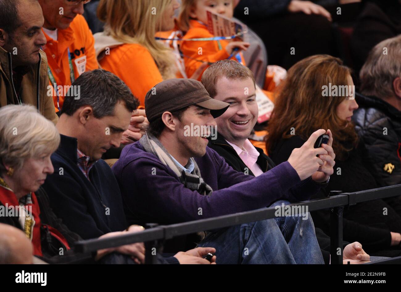 Olympic swimmer champion Michael Phelps watching with friends the short ...