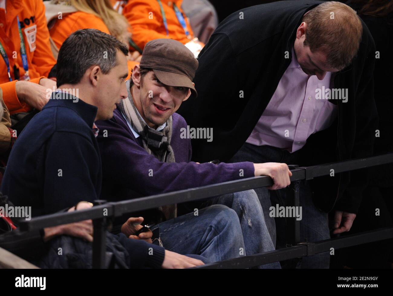 Olympic swimmer champion Michael Phelps watching with friends the short ...