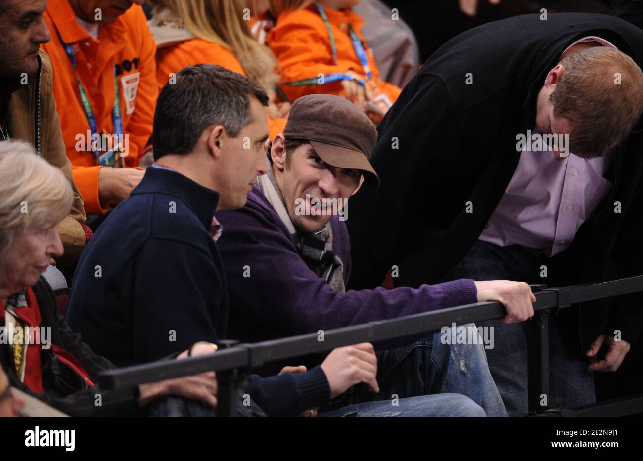 Olympic swimmer champion Michael Phelps watching with friends the short ...