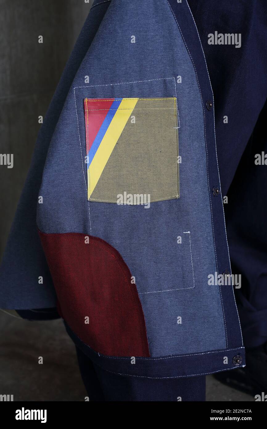 Red Yellow Blue detail jeans jacket pocket Stock Photo - Alamy