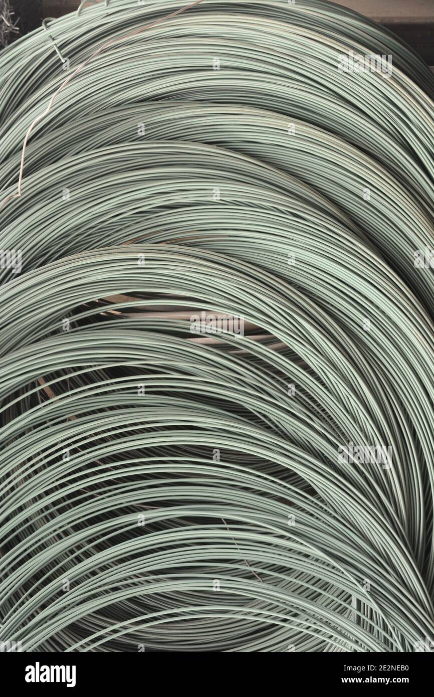 Industry wire roll up in storage. Construction Material - Roll of Metal ...