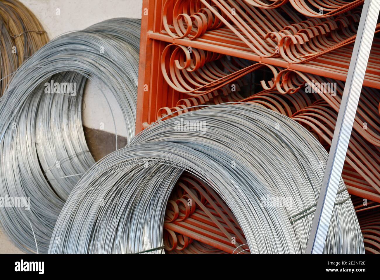 Industry wire roll up in storage. Construction Material - Roll of Metal ...