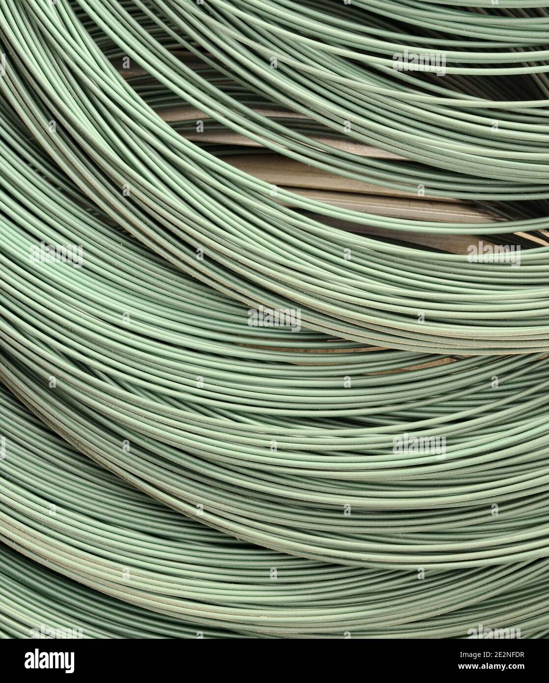 Industry wire roll up in storage. Construction Material - Roll of Metal ...