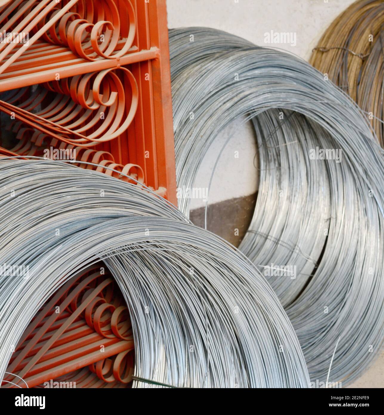Industry wire roll up in storage. Construction Material - Roll of Metal ...