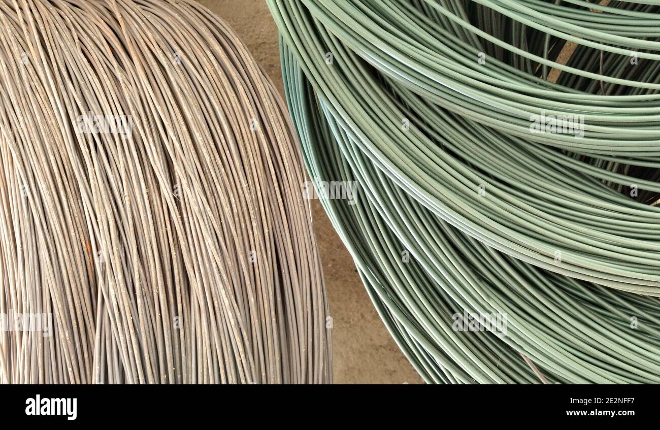 Industry wire roll up in storage. Construction Material - Roll of Metal ...
