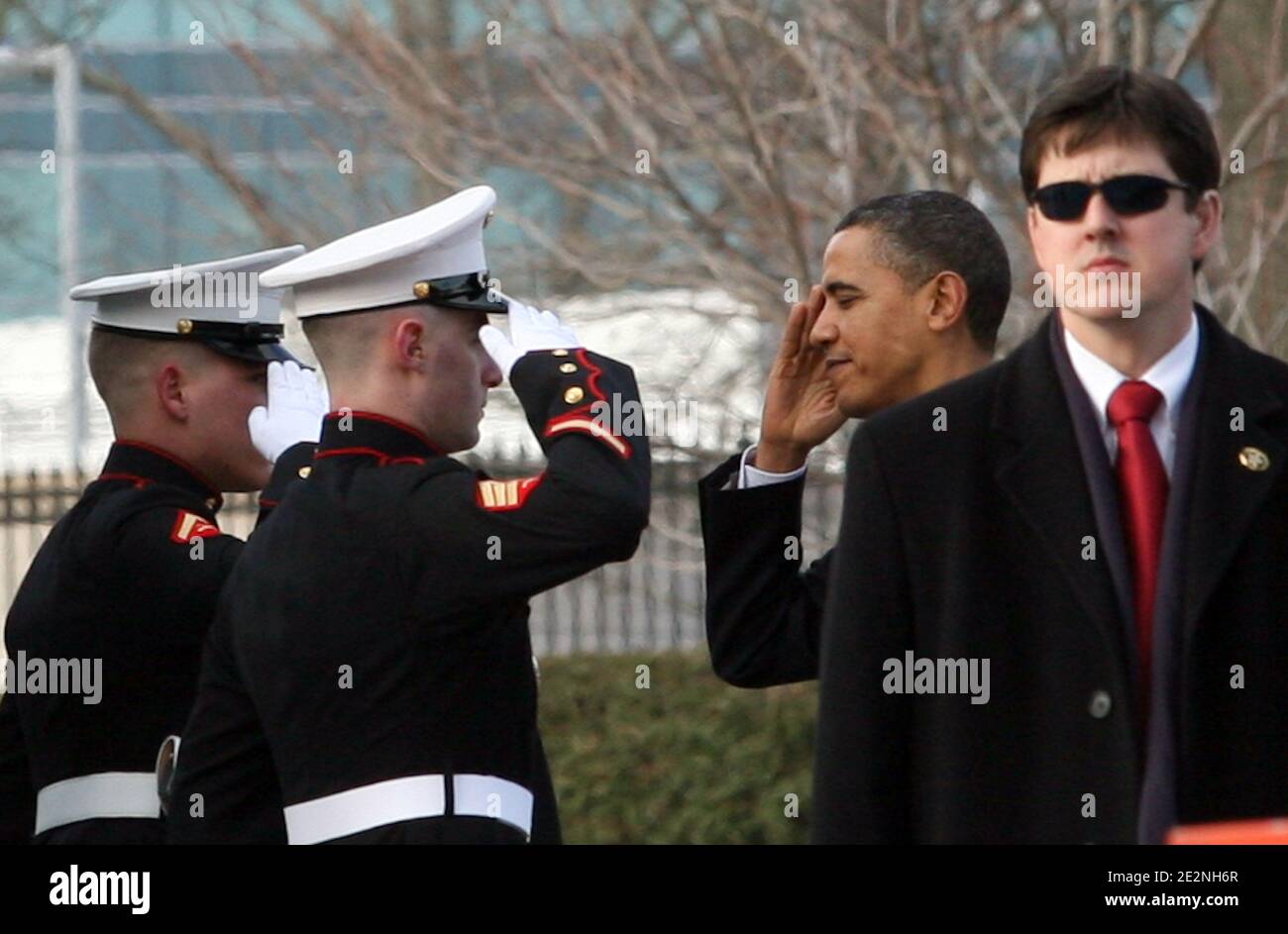 US President Barack Obama salute Marines prior to board Marine One at ...