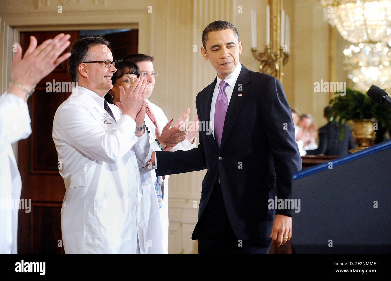 US President Barack Obama makes his way to the podium to deliver ...