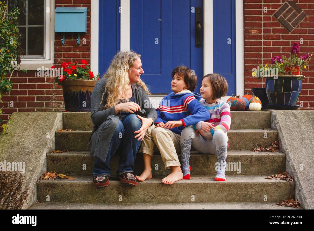 10 year old girl sitting full length hi-res stock photography and ...