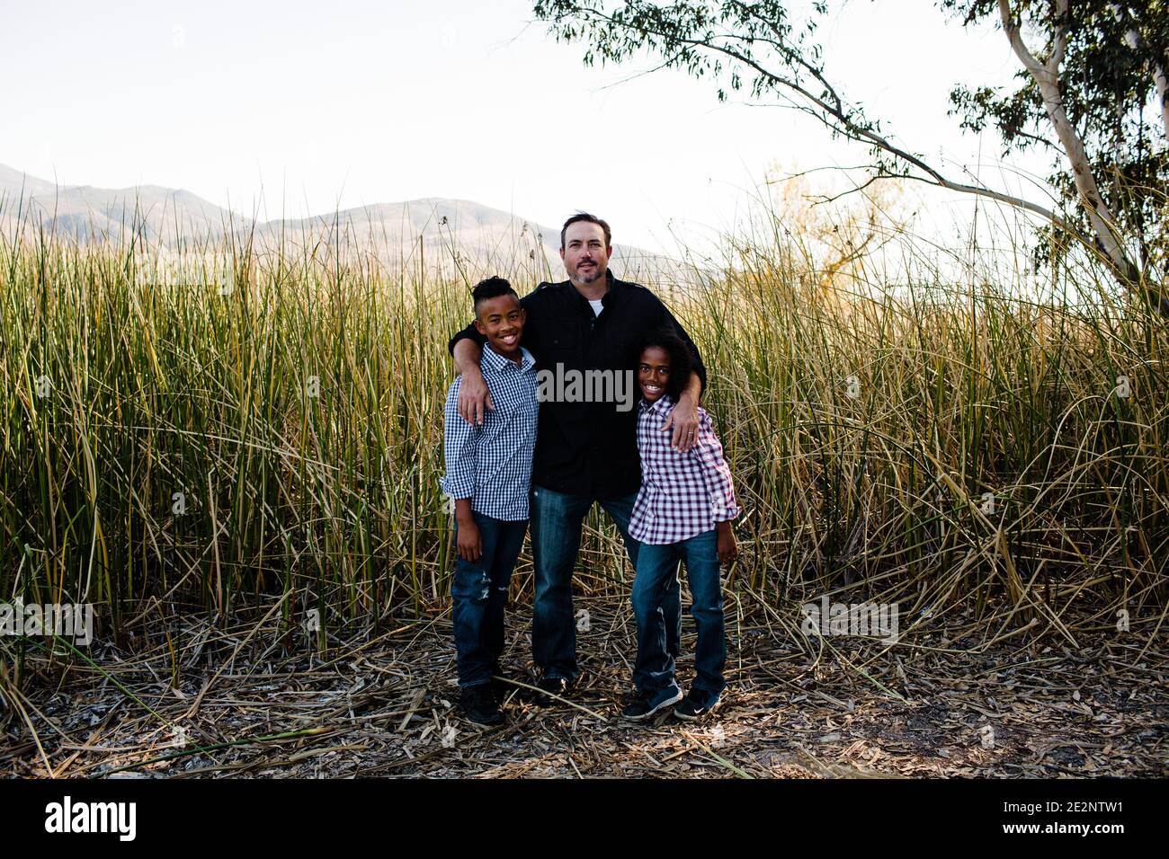 Father Posing with Sons at Park in Chula Vista Stock Photo - Alamy