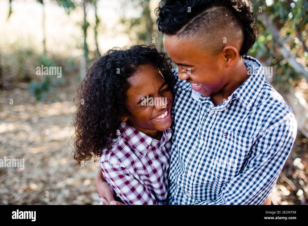 Brothers Laughing & Embracing at Park in Chula Vista Stock Photo - Alamy