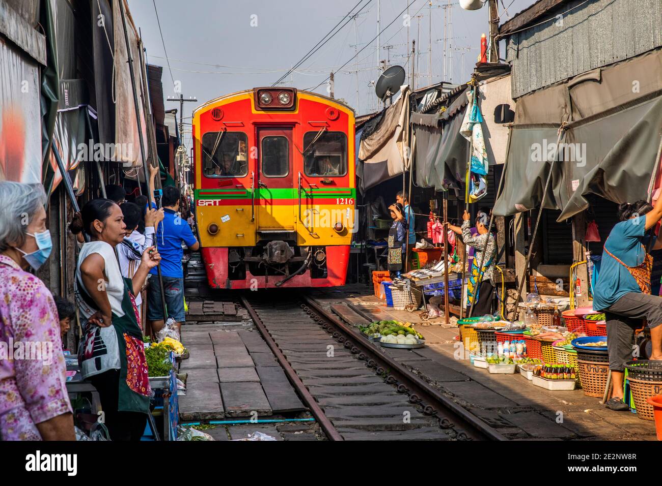 Slow Moving Train Rolls Through the Train Market in Thailand Stock ...