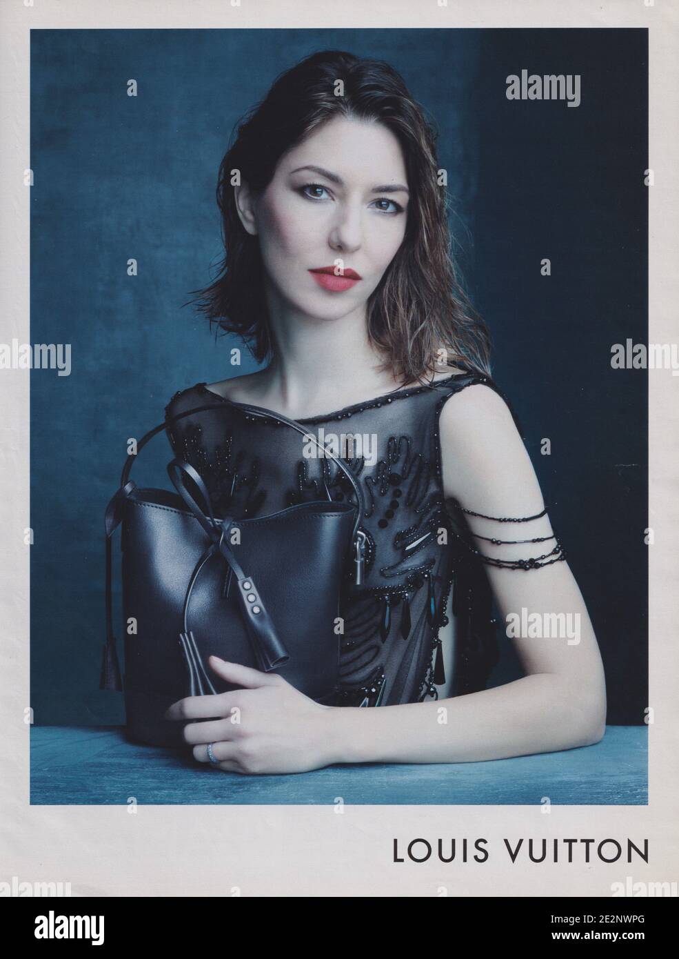 poster advertising Louis Vuitton with Sofia Coppola in paper magazine ...
