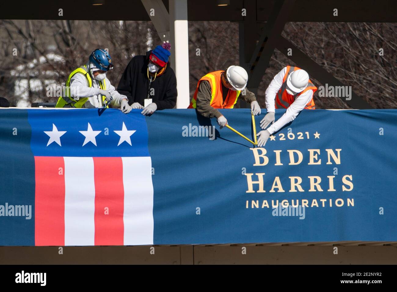 Washington, United States Of America. 14th Jan, 2021. Workers hang ...