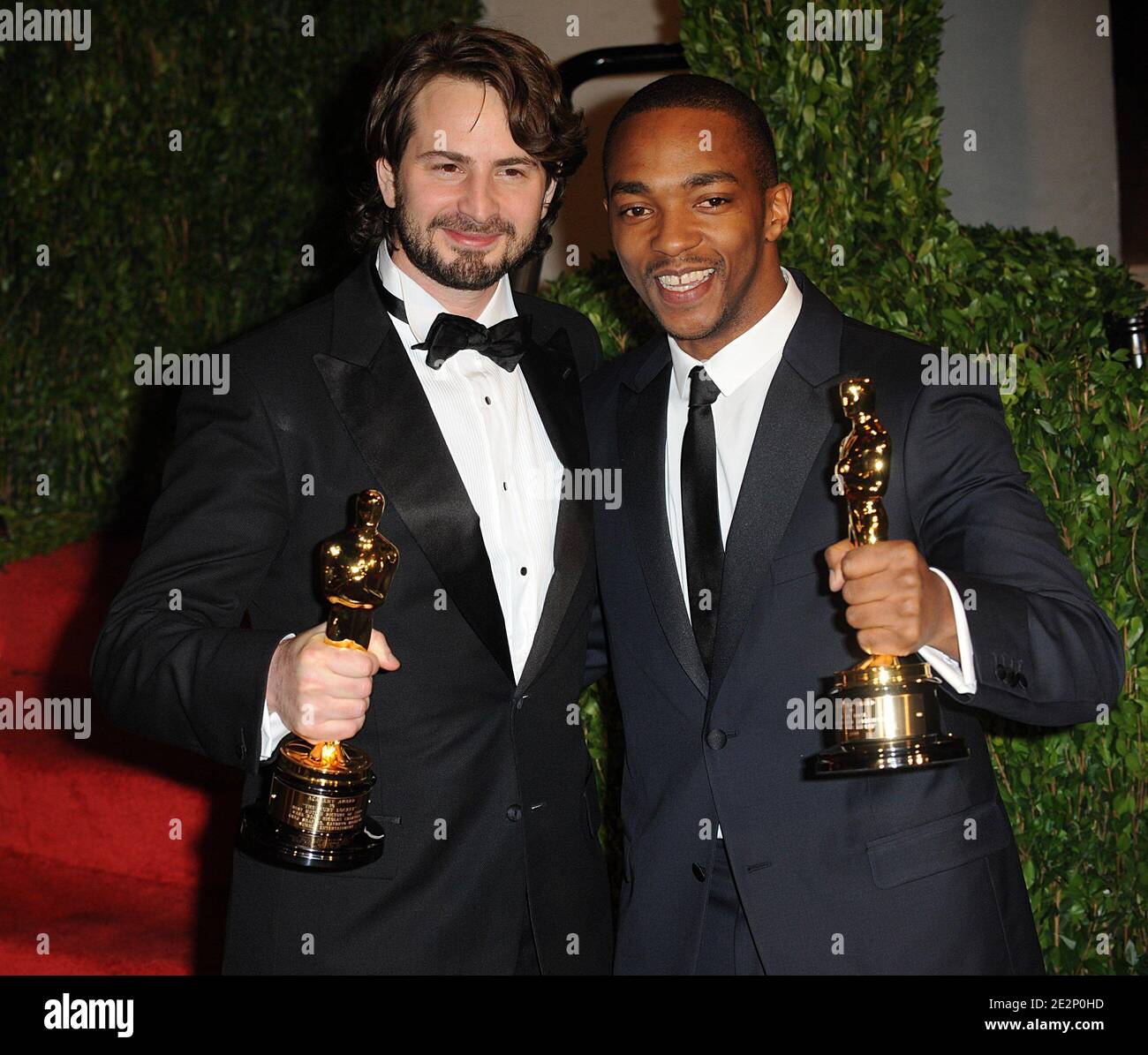 Mark Boal (left) Anthony Mackie arriving at the Vanity Fair Oscar Party ...