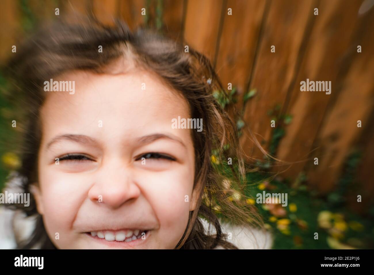 close up of little girl smiling outside with lens blur effect Stock ...