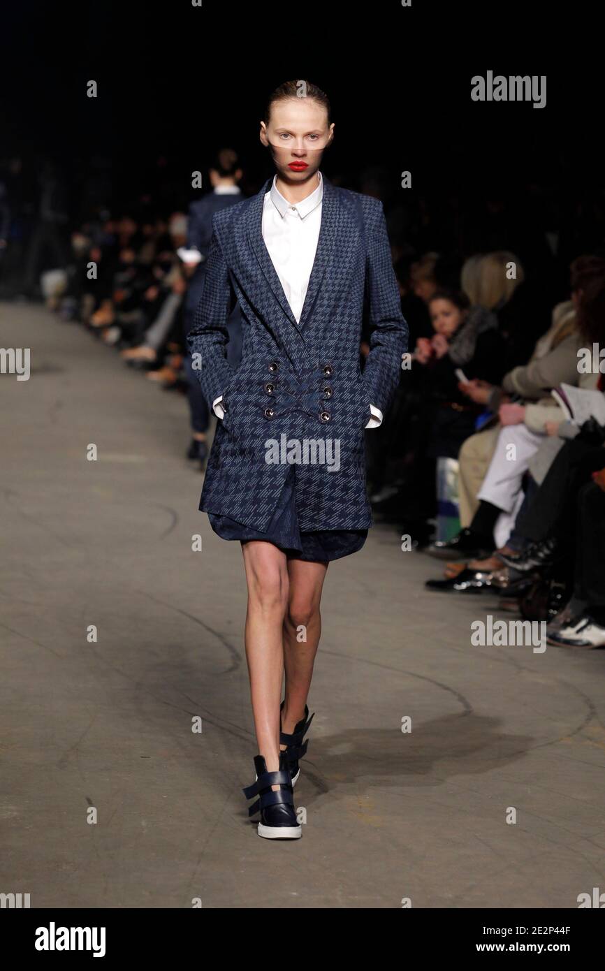 A model wears a creation by designers Marithe and Francois Girbaud for ...