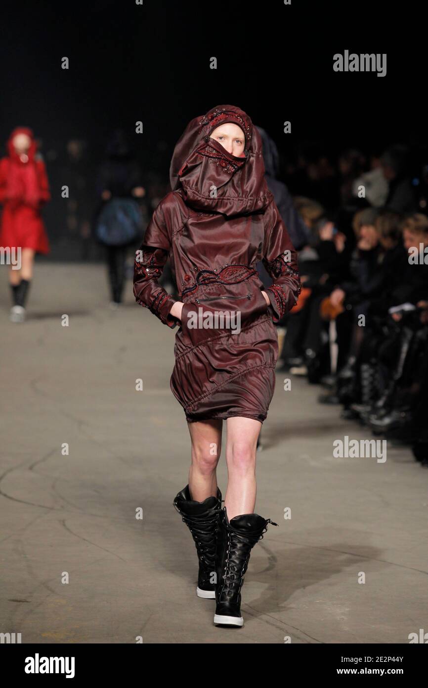 A model wears a creation by designers Marithe and Francois Girbaud for ...