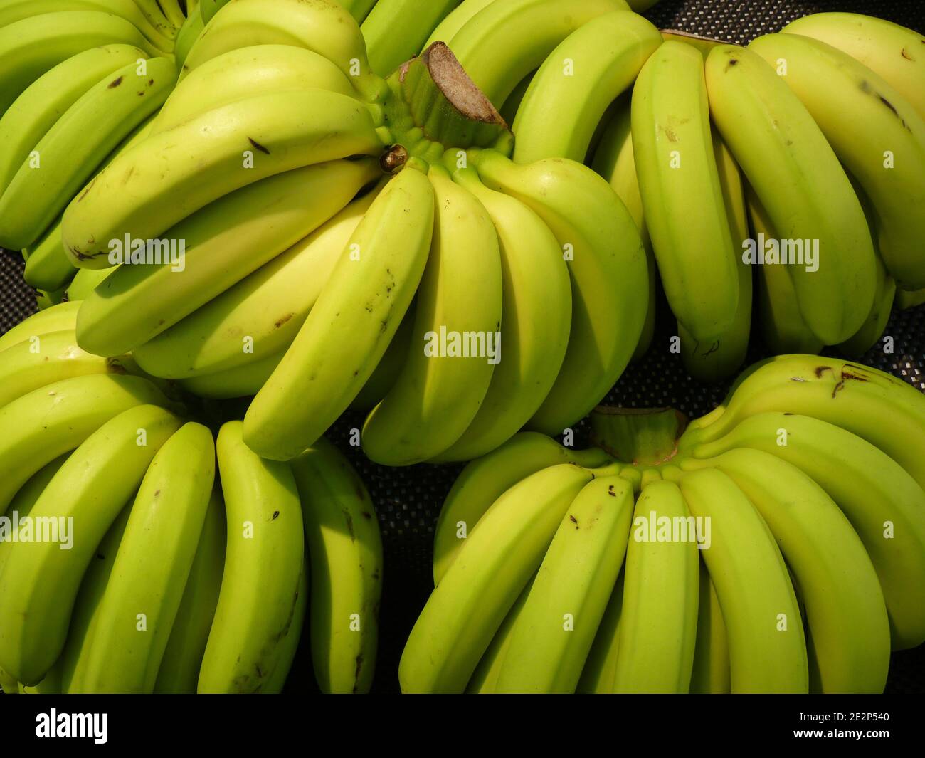 Closeup shot of ripe bananas stuck together Stock Photo - Alamy