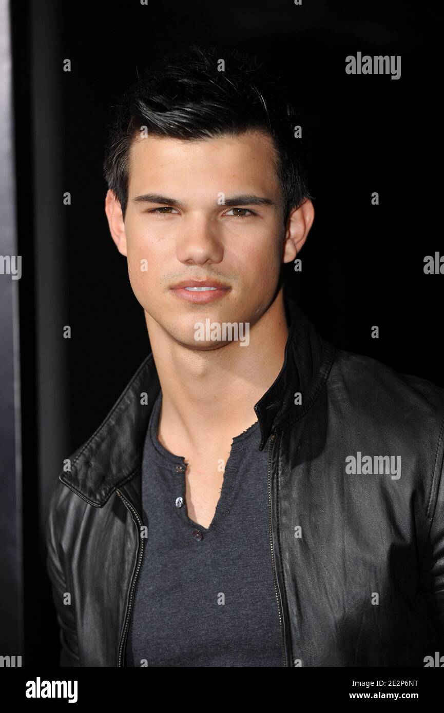 Taylor Lautner arriving for the premiere of Apparition's 'The Runaways ...