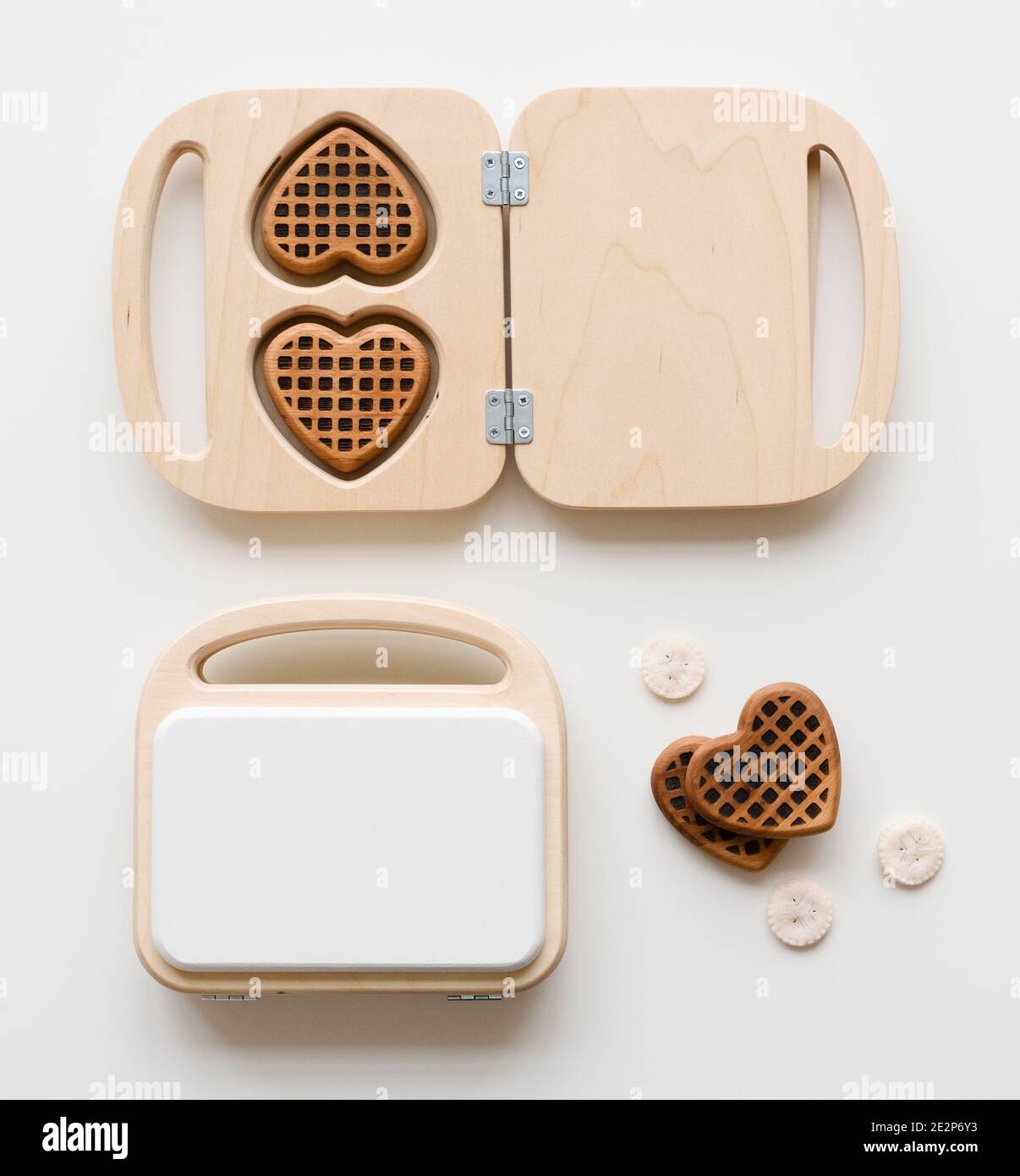 Toys for children play kitchen. Wooden waffle maker and heart shape ...