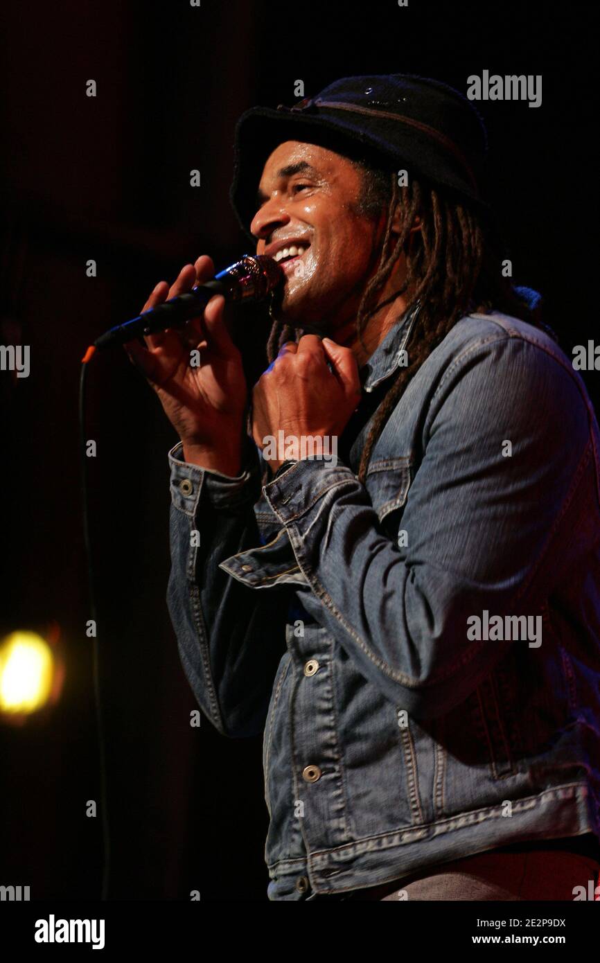 French singer Yannick Noah performs during a unique benefit-concert for ...