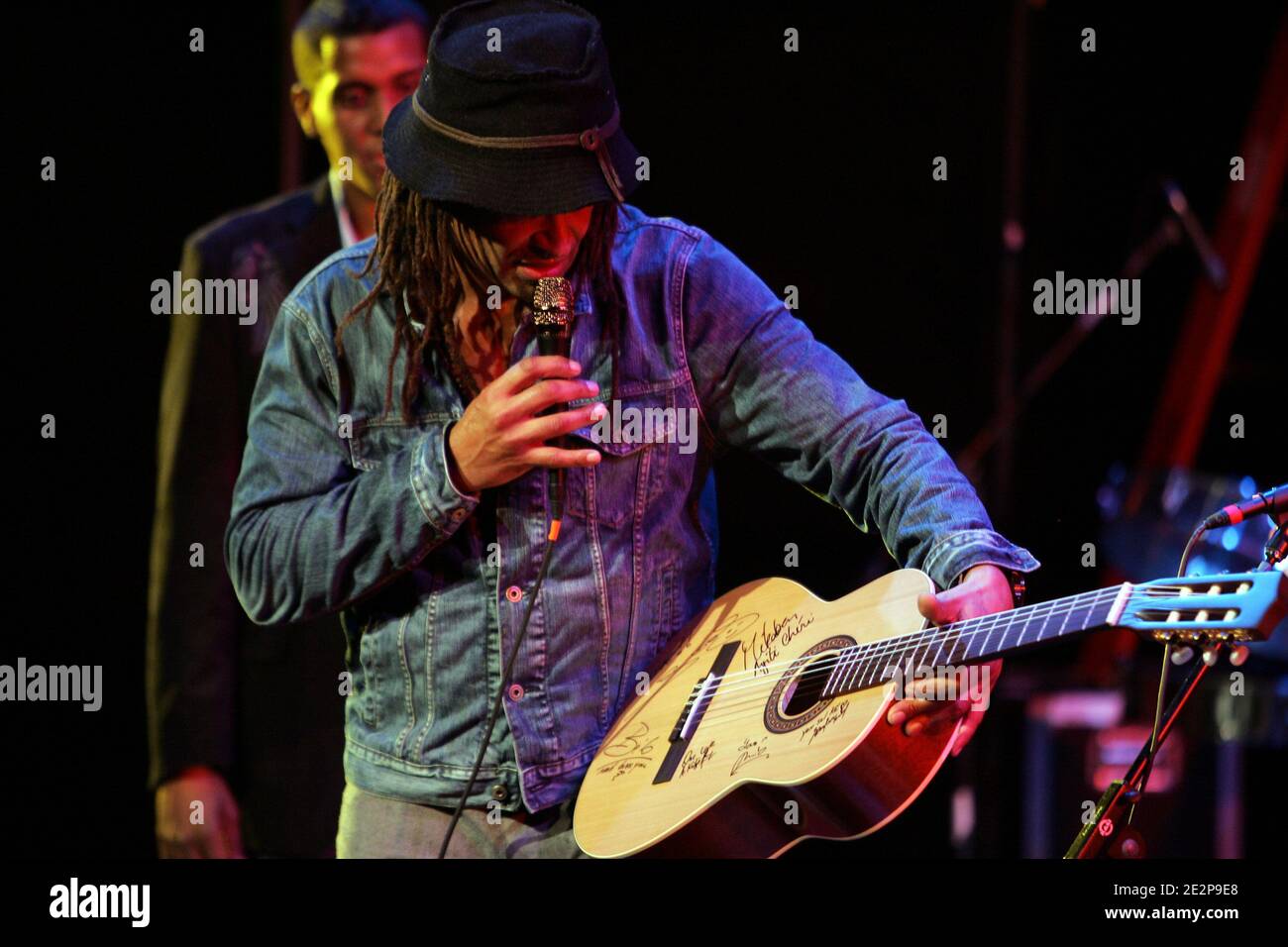 French singer Yannick Noah performs during a unique benefit-concert for ...