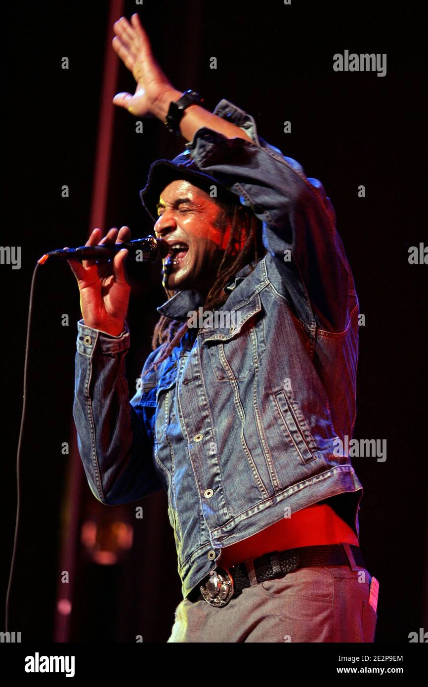 French singer Yannick Noah performs during a unique benefit-concert for ...
