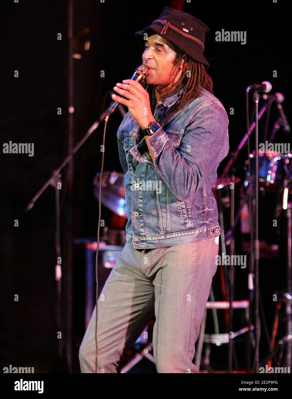 French singer Yannick Noah performs during a unique benefit-concert for ...