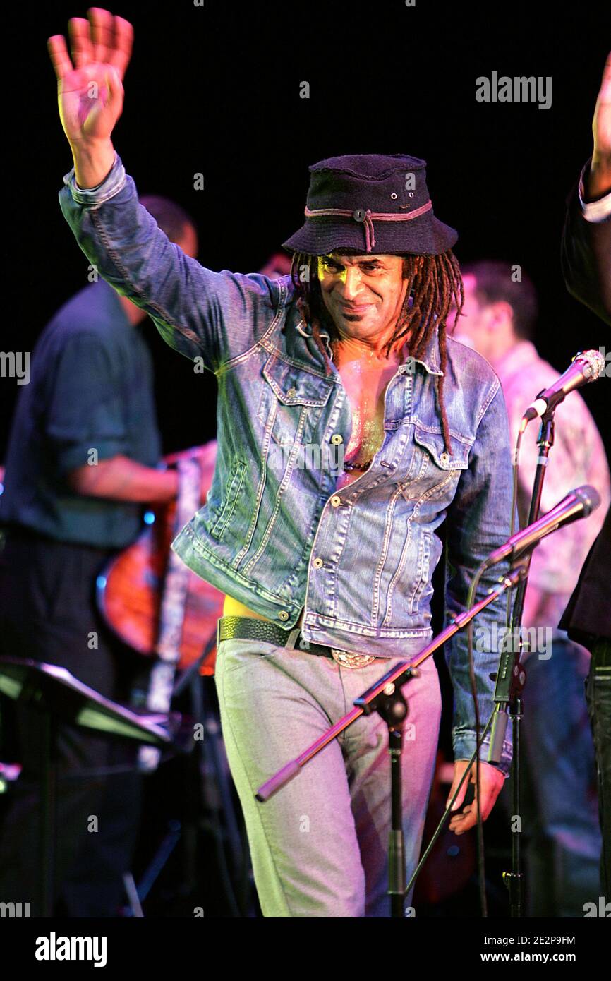 French singer Yannick Noah performs during a unique benefit-concert for ...