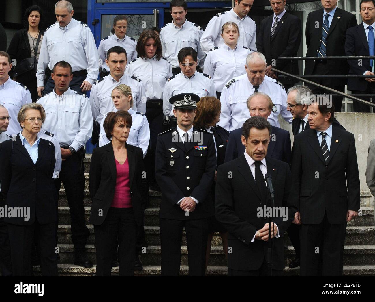 French President Nicolas Sarkozy speaks to the media behind French ...