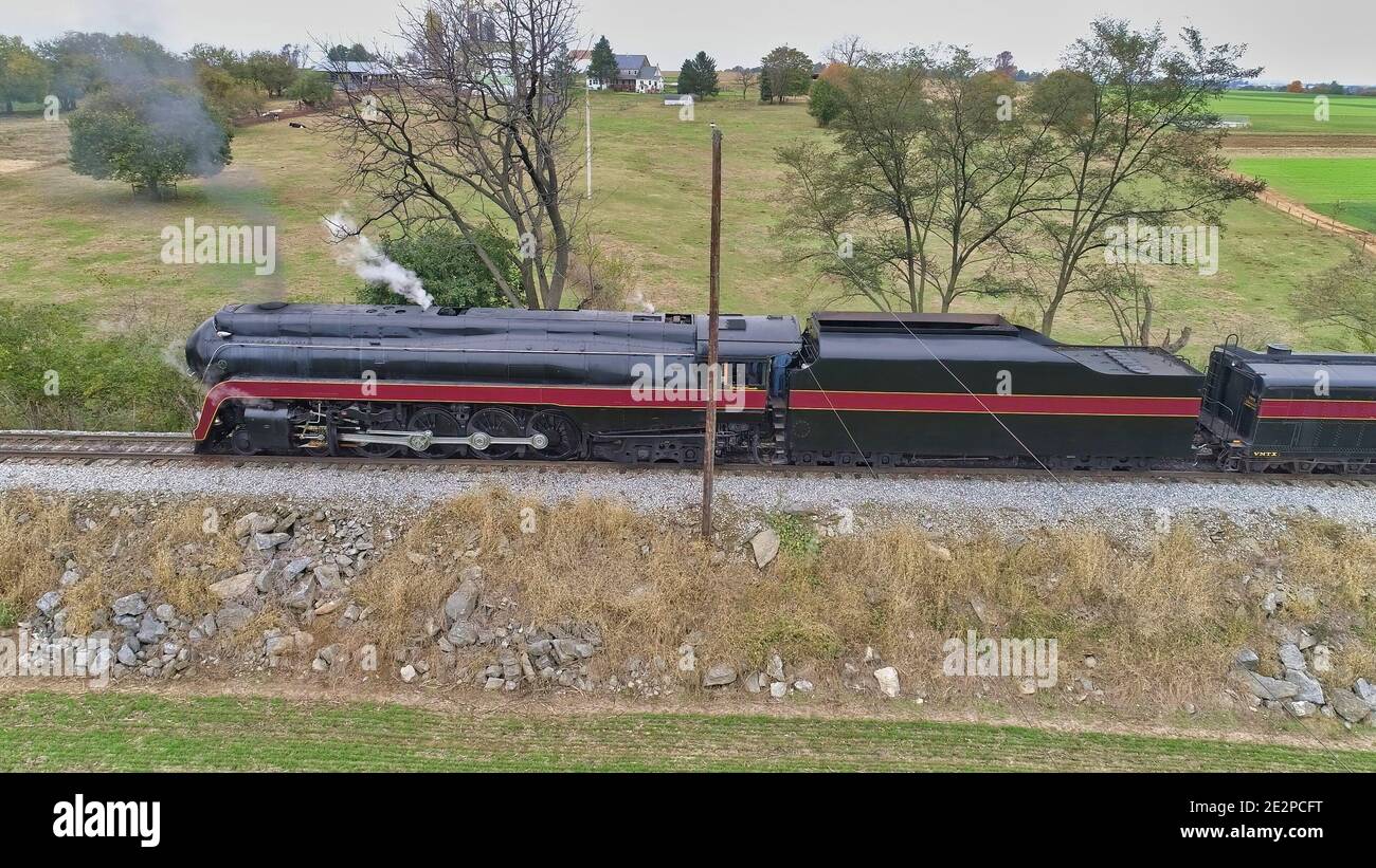 Aerial View of a Restored Antique Steam Locomotive Pulling Passenger ...