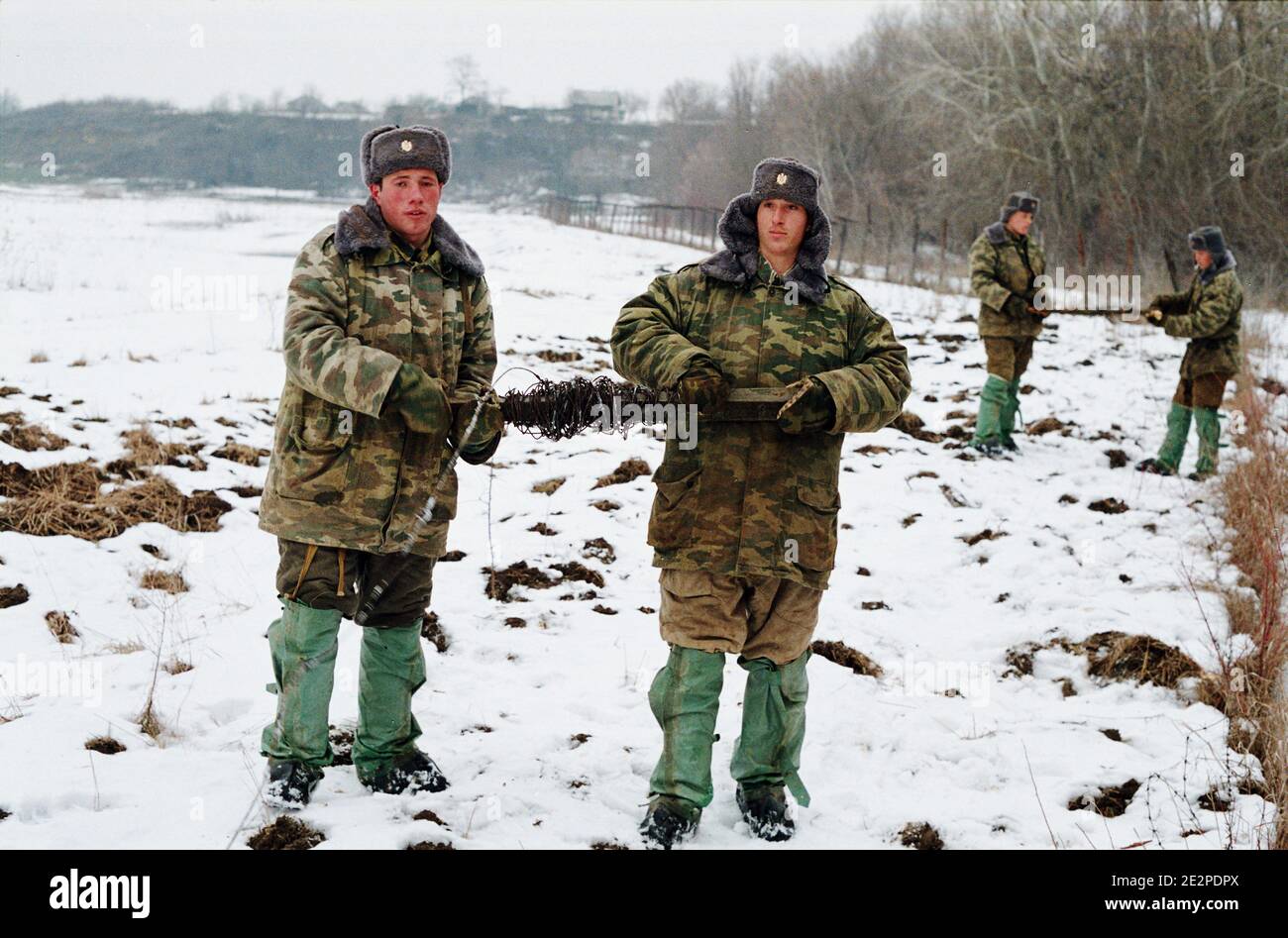 Border Guards Working To Remove The Barbed Wire Between Moldova And