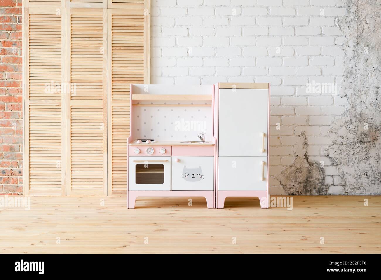 Play kitchen for children. Pink and white wooden toy kitchen with sink ...