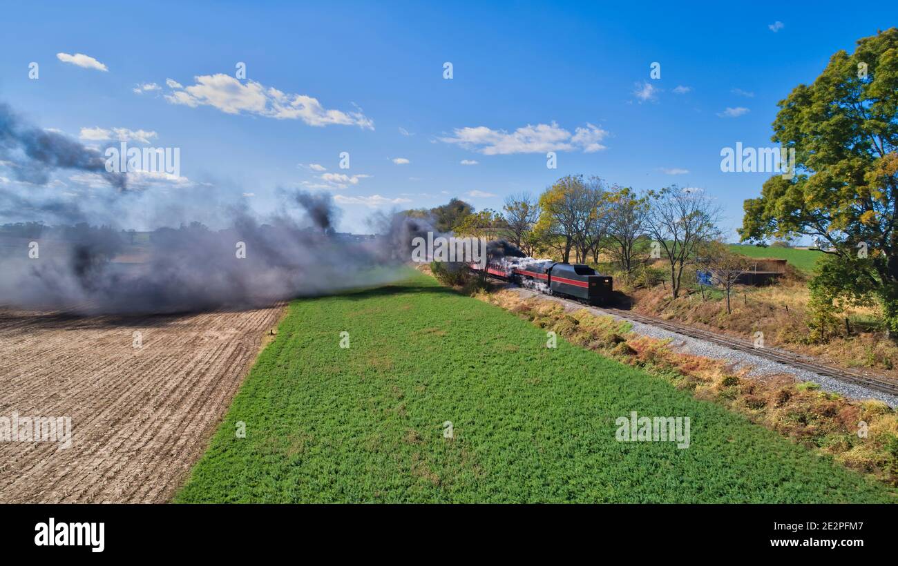 Aerial View of a Restored Antique Steam Locomotive Pulling Passenger ...