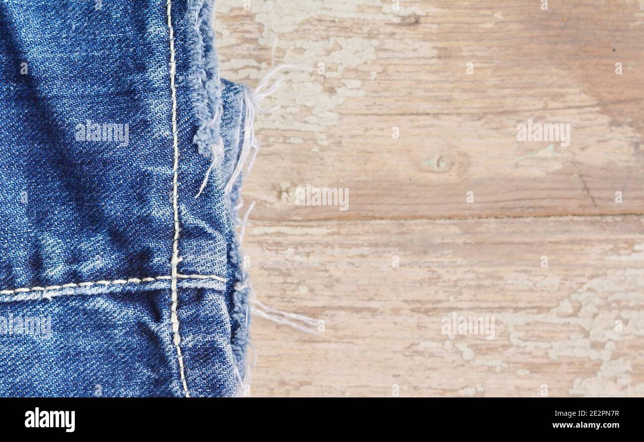 Blue jeans on rustic wooden board. Logging for shop and sale. Jeans ...