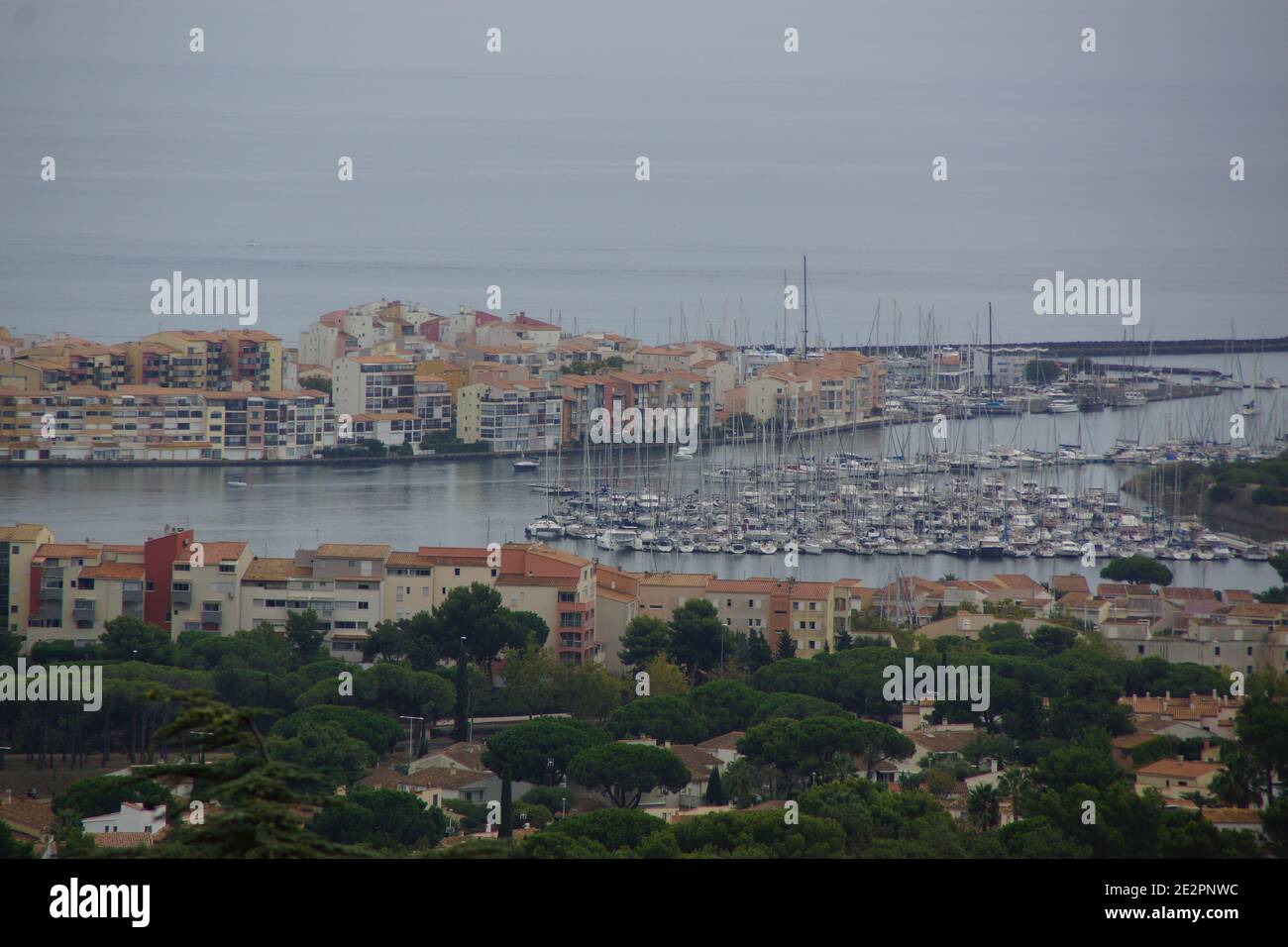 Beautiful scenery of a port with living houses and trees Stock Photo ...