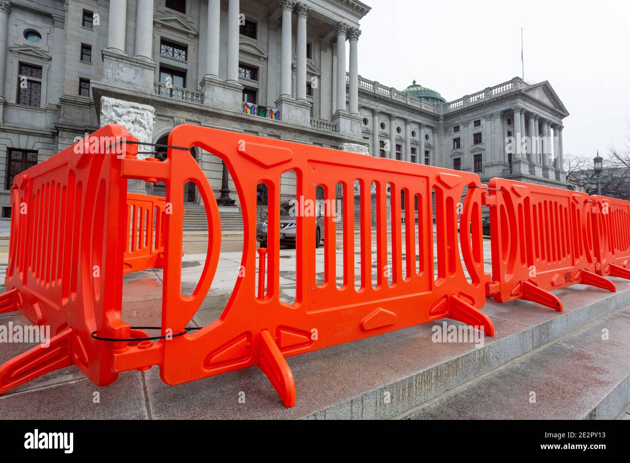 Orange barricades are erected outside of the Pennsylvania Capitol.An ...