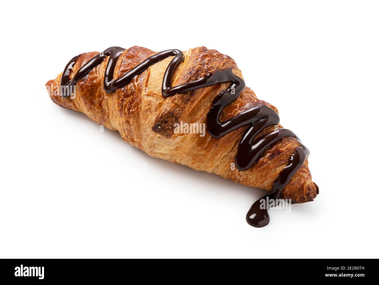 One croissant with chocolate sauce on a white background Stock Photo ...