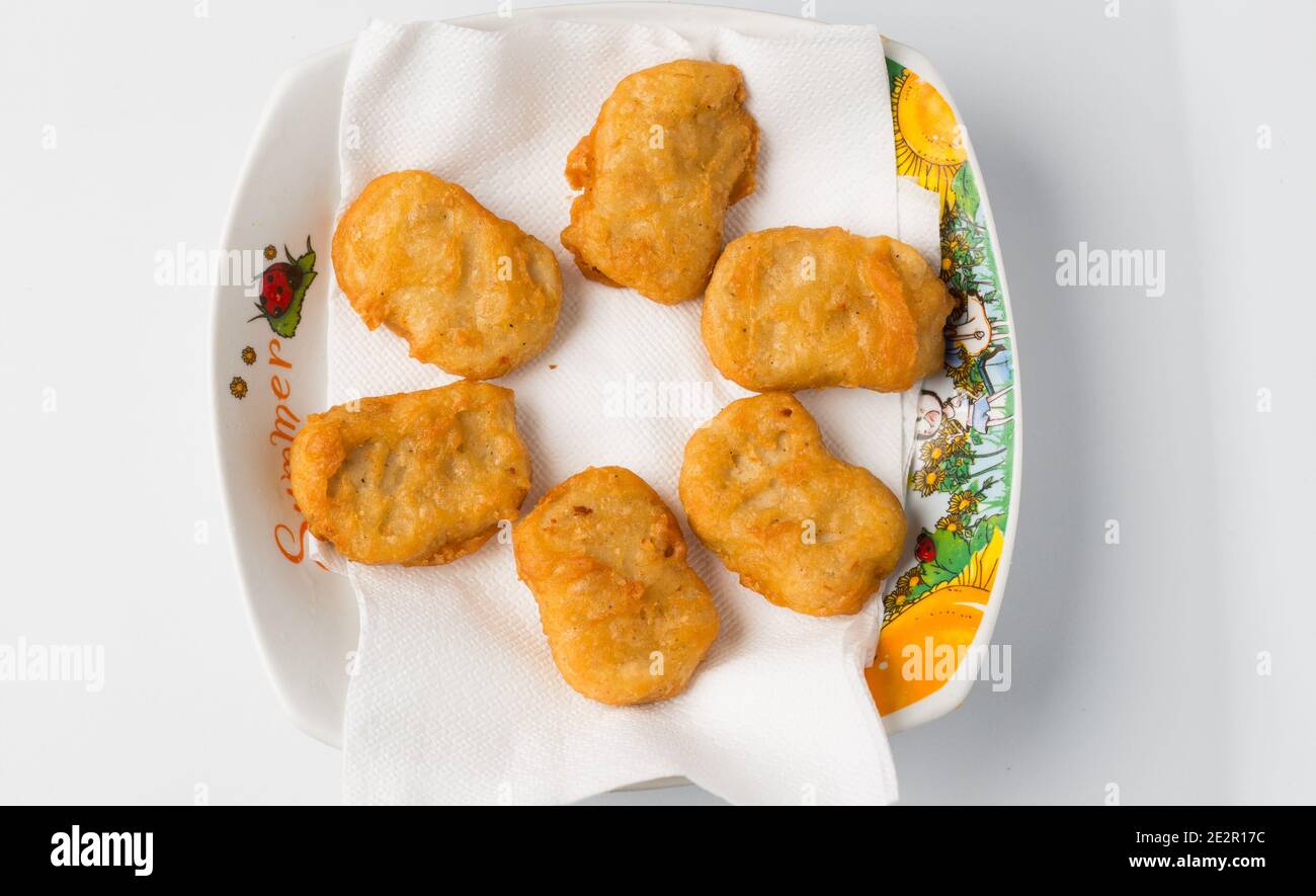 Top view of chicken nuggets on a plate Stock Photo - Alamy
