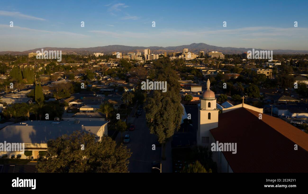 Sunset aerial view of the downtown skyline of Santa Ana, California ...