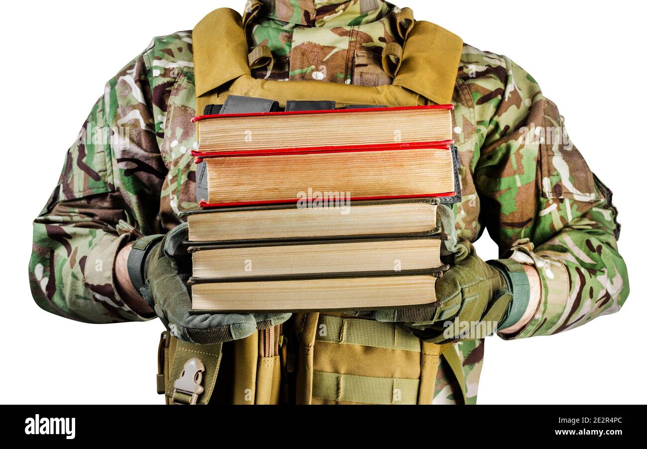 Isolated photo of a soldier in uniform holding stack of books on white ...