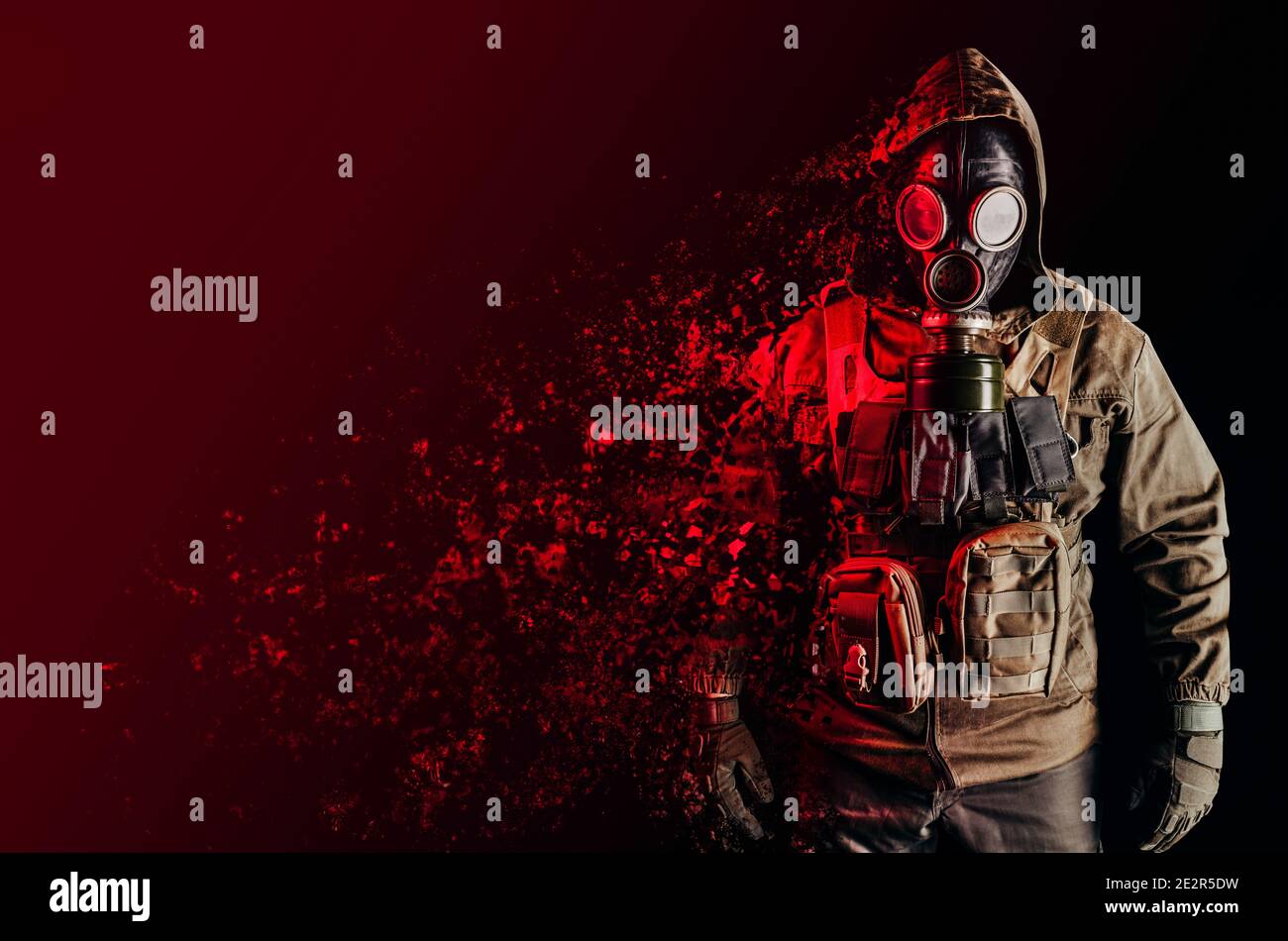 Photo of a stalker soldier in soviet gas mask, jacket and armored vest ...