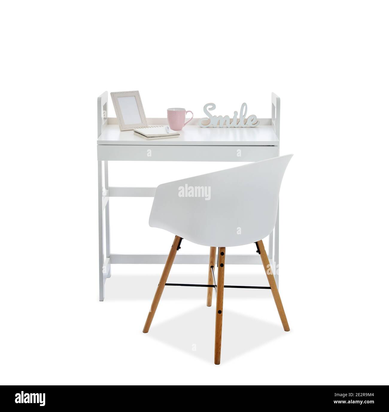 Stylish table and chair on white background Stock Photo - Alamy